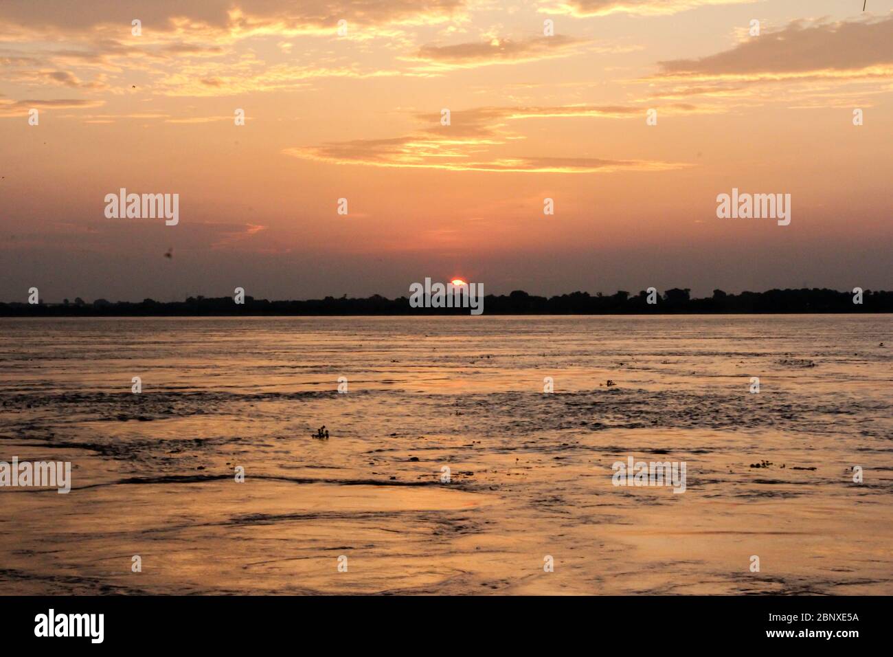 India, Varanasi - State of Uttar Pradesh, July 31, 2013. Sunrise on the ...