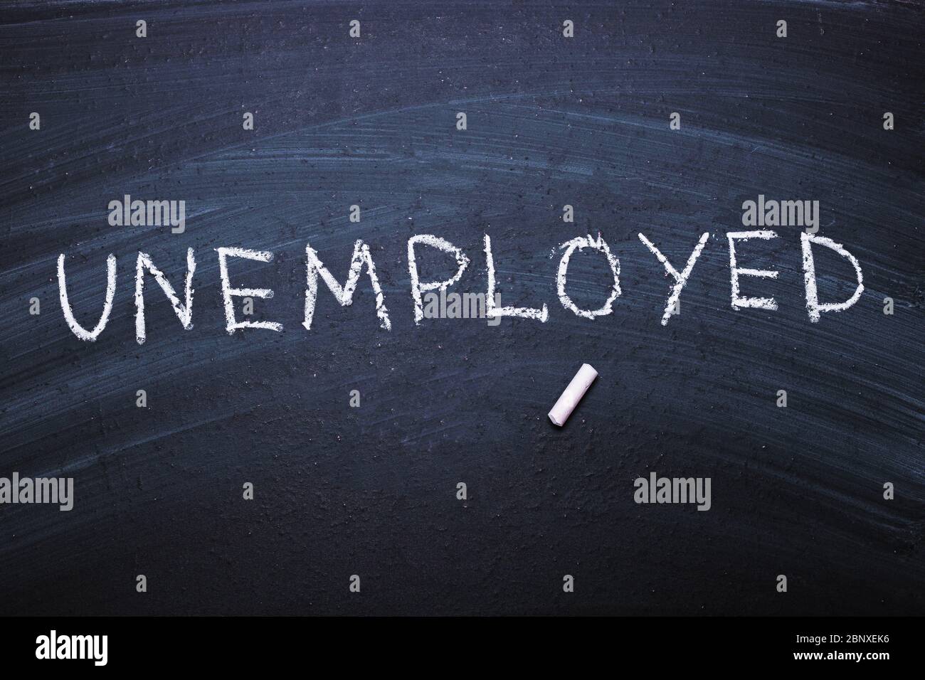 Word unemployed written in chalk. Concept of hiring, new job, vacancy ...