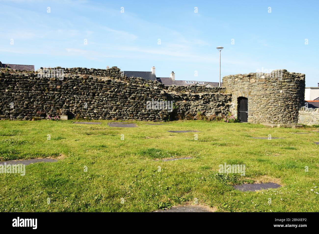 The Walls and corner tower at Holyhead Roman Fort on Anglesey Stock ...