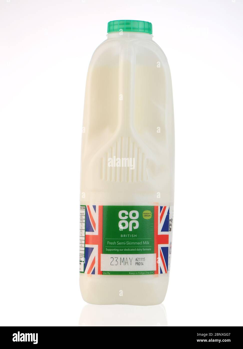 Co-op milk plastic bottles isolated against a white background with a ...