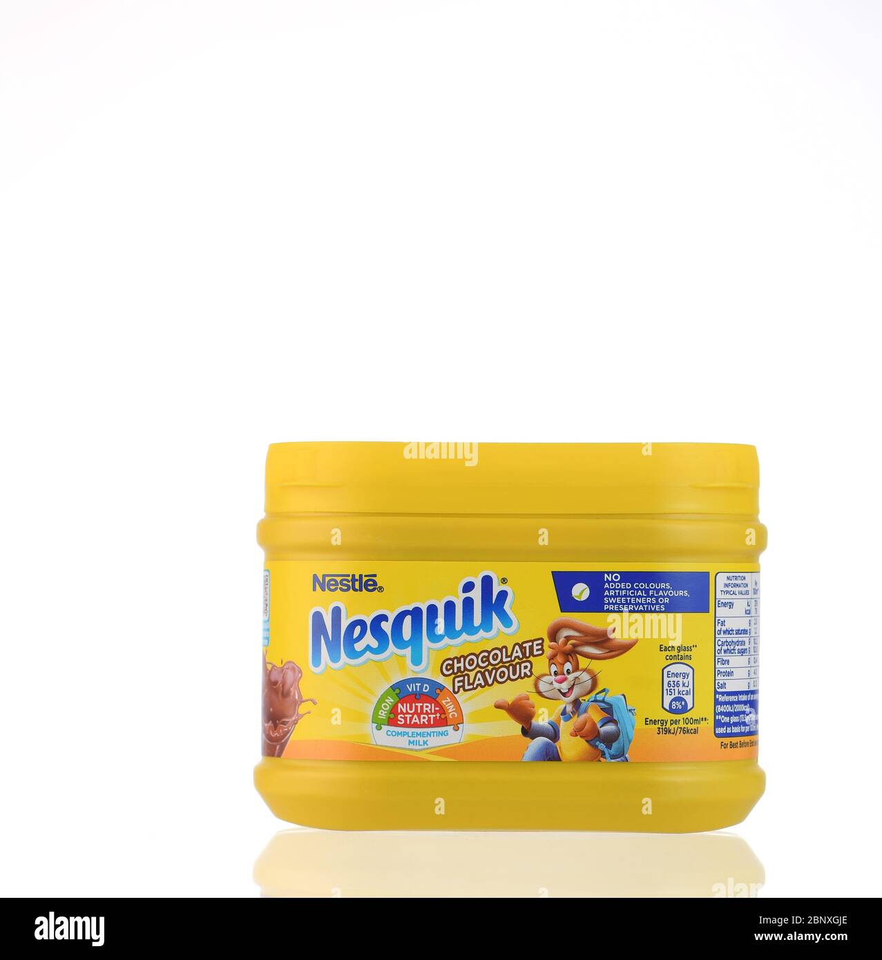 Nesquik milkshake mix product in a yellow plastic container isolated ...