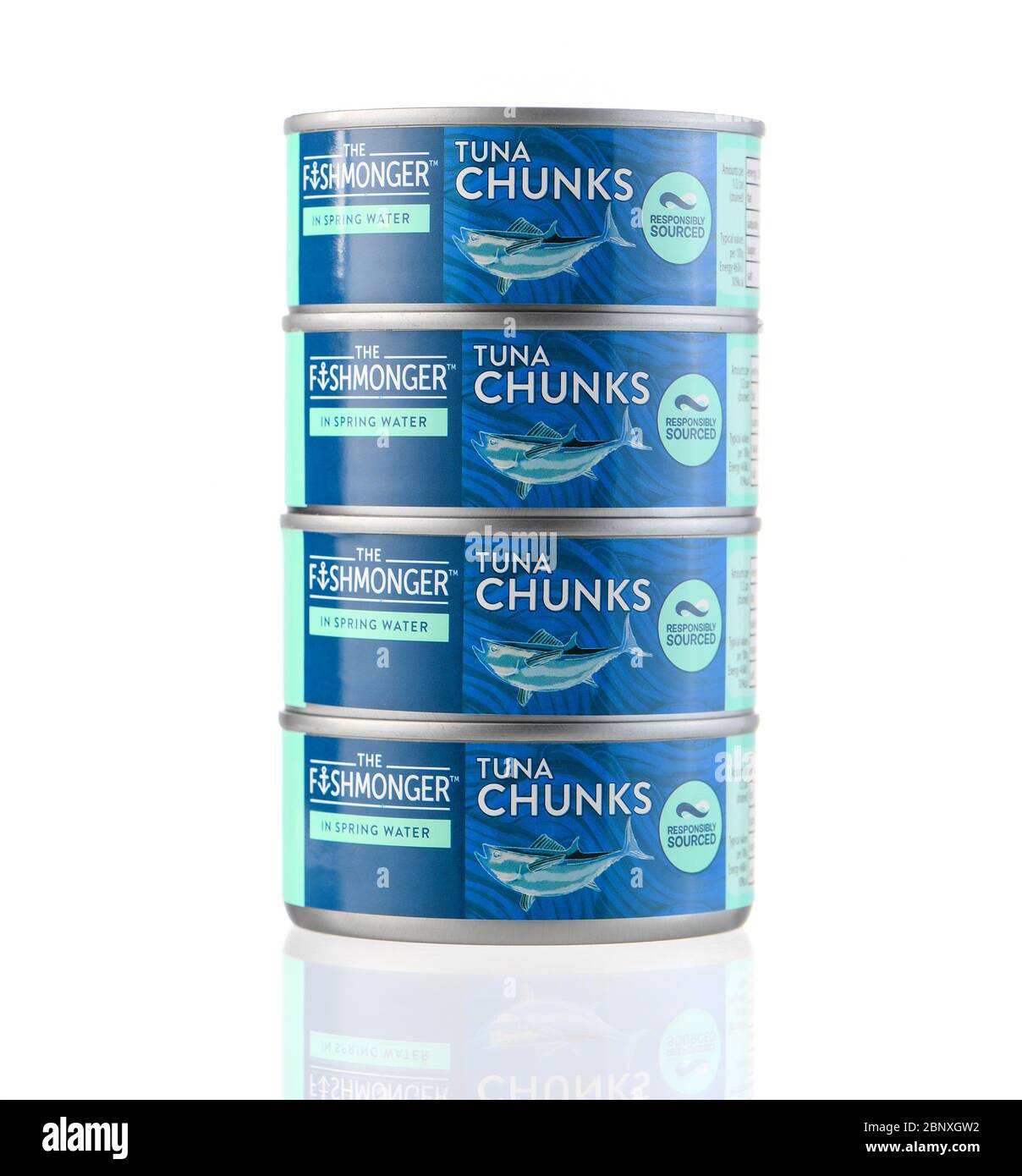 The fishmonger tuna chunks in spring water tin isolated on a white ...