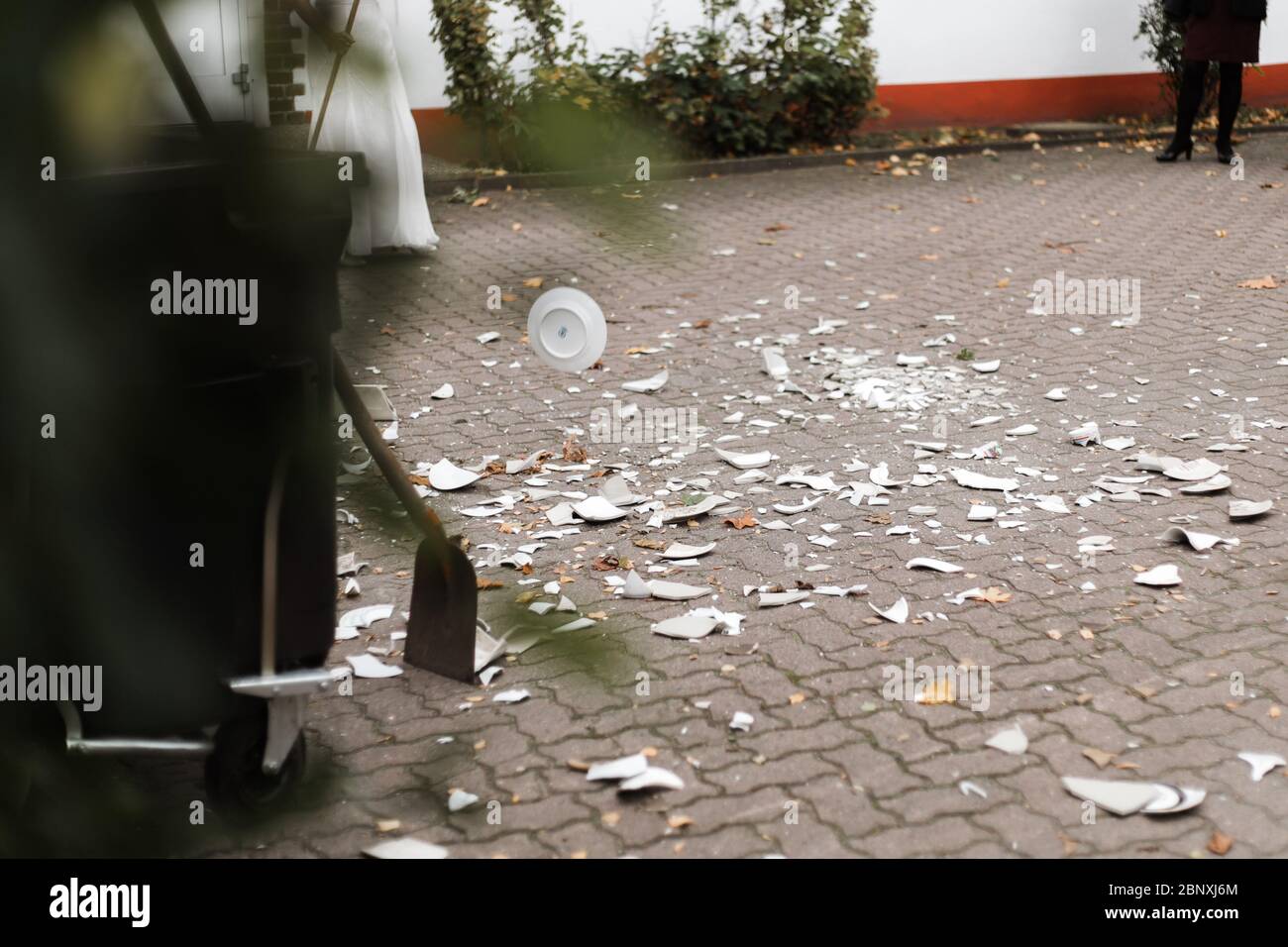 photo of broken plates on the floor Stock Photo - Alamy