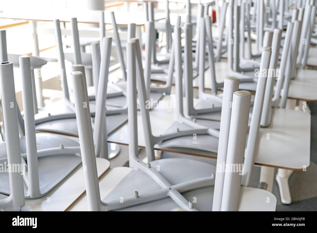 Inverted chair, cleaning table and floor rooms Cafe. Indoor Stock Photo ...