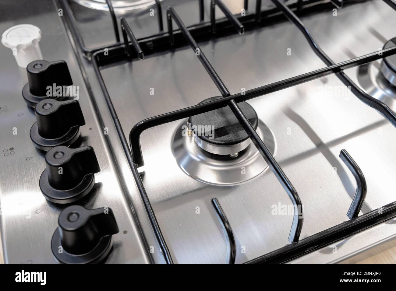 Close up of Kitchen gas stove in the kitchen. Steel Stock Photo - Alamy