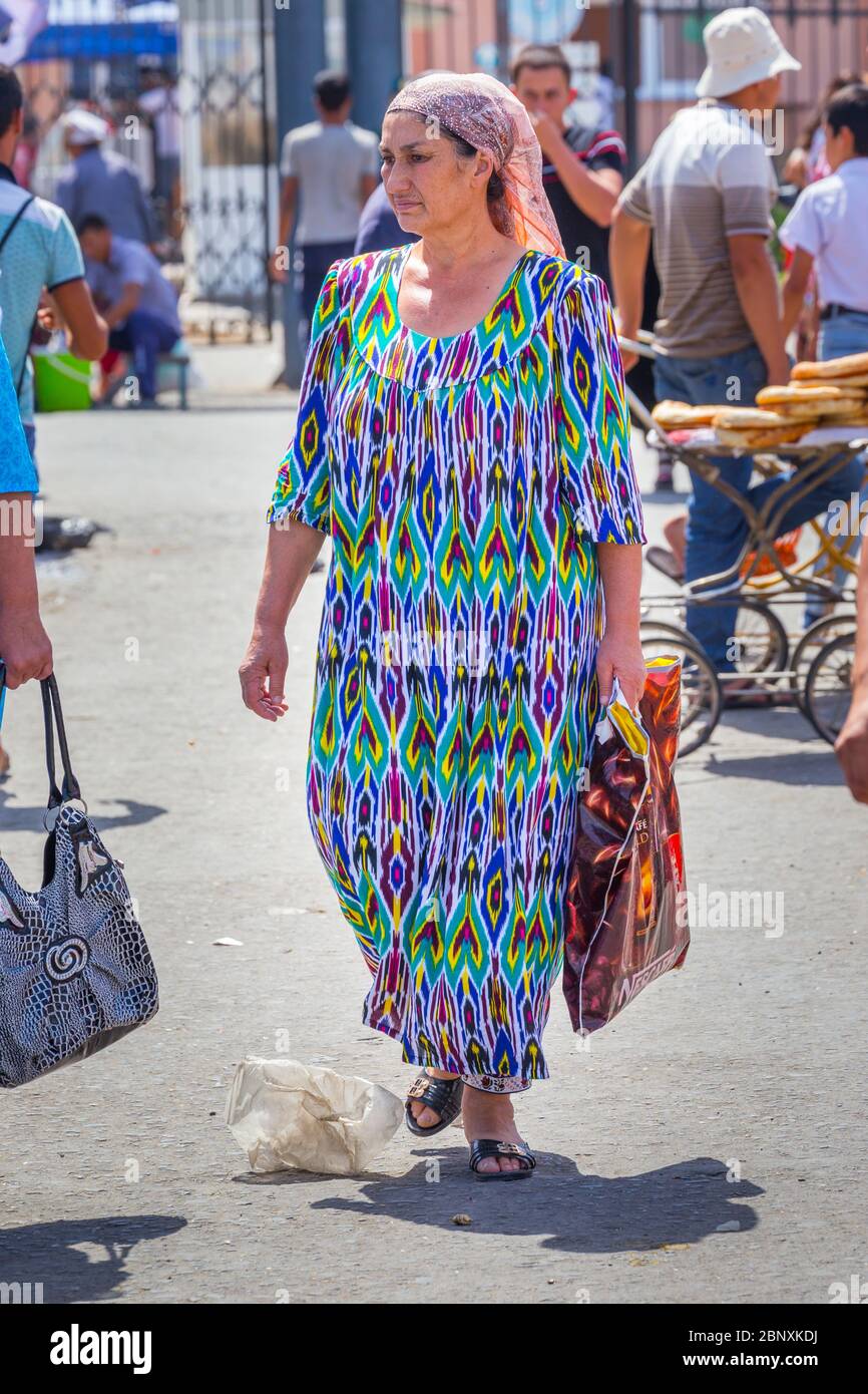 SAMARKAND, UZBEKISTAN - AUGUST 29, 2016: a woman goes shopping at the ...