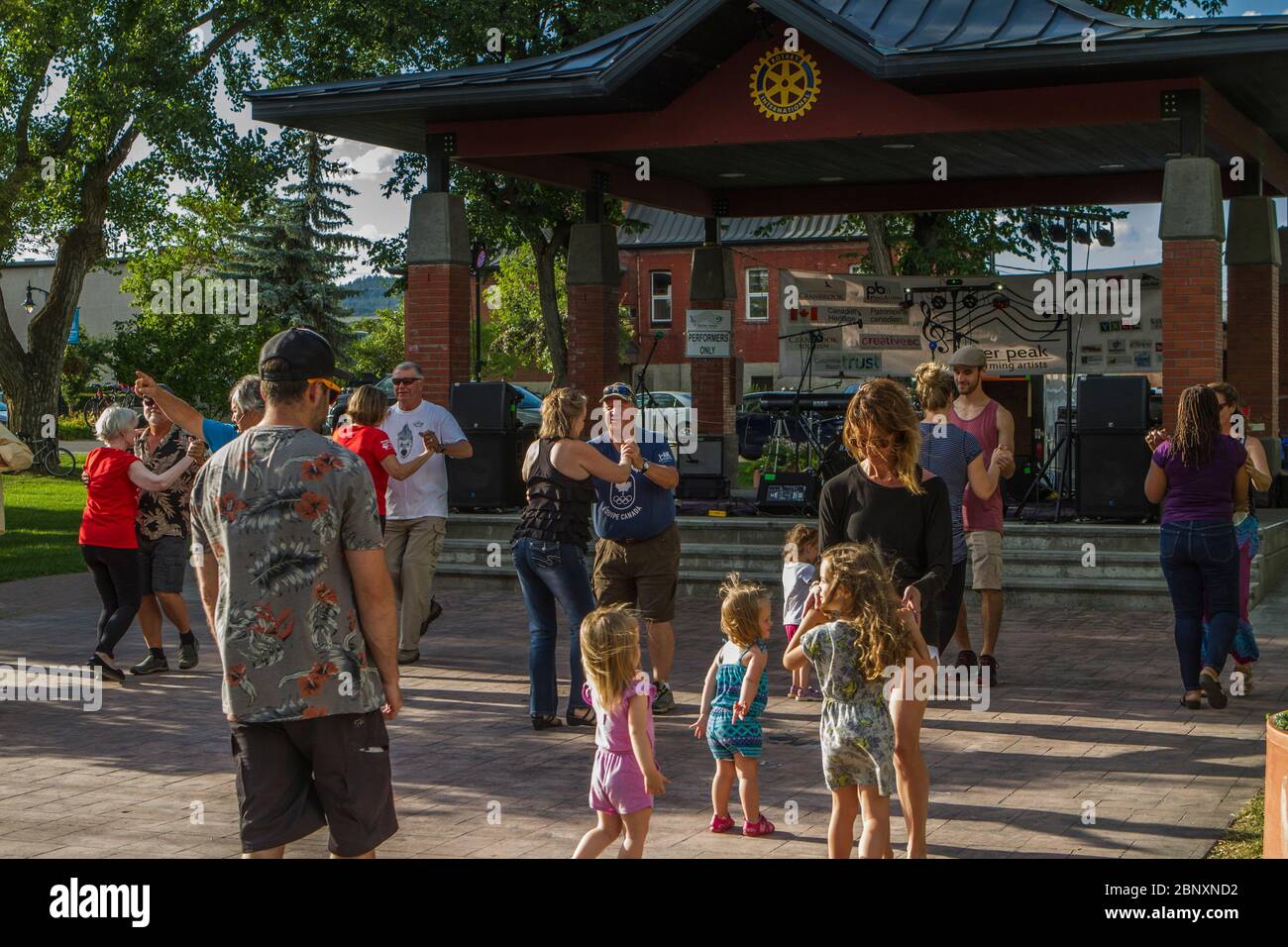 People dancing and having fun at outdoor concert Stock Photo - Alamy