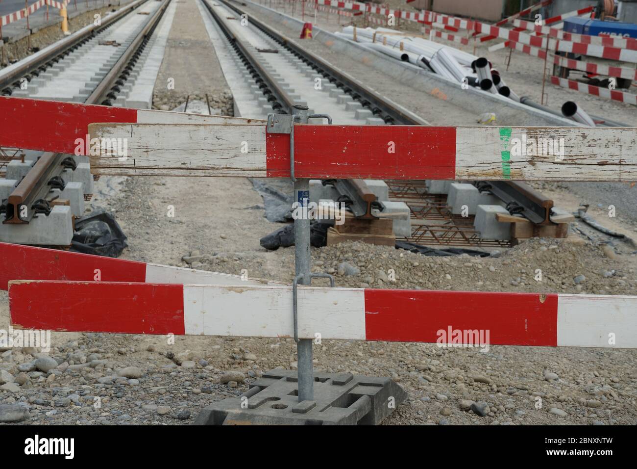 Constructing of street-car line, embedding of metal rails in a concrete ...