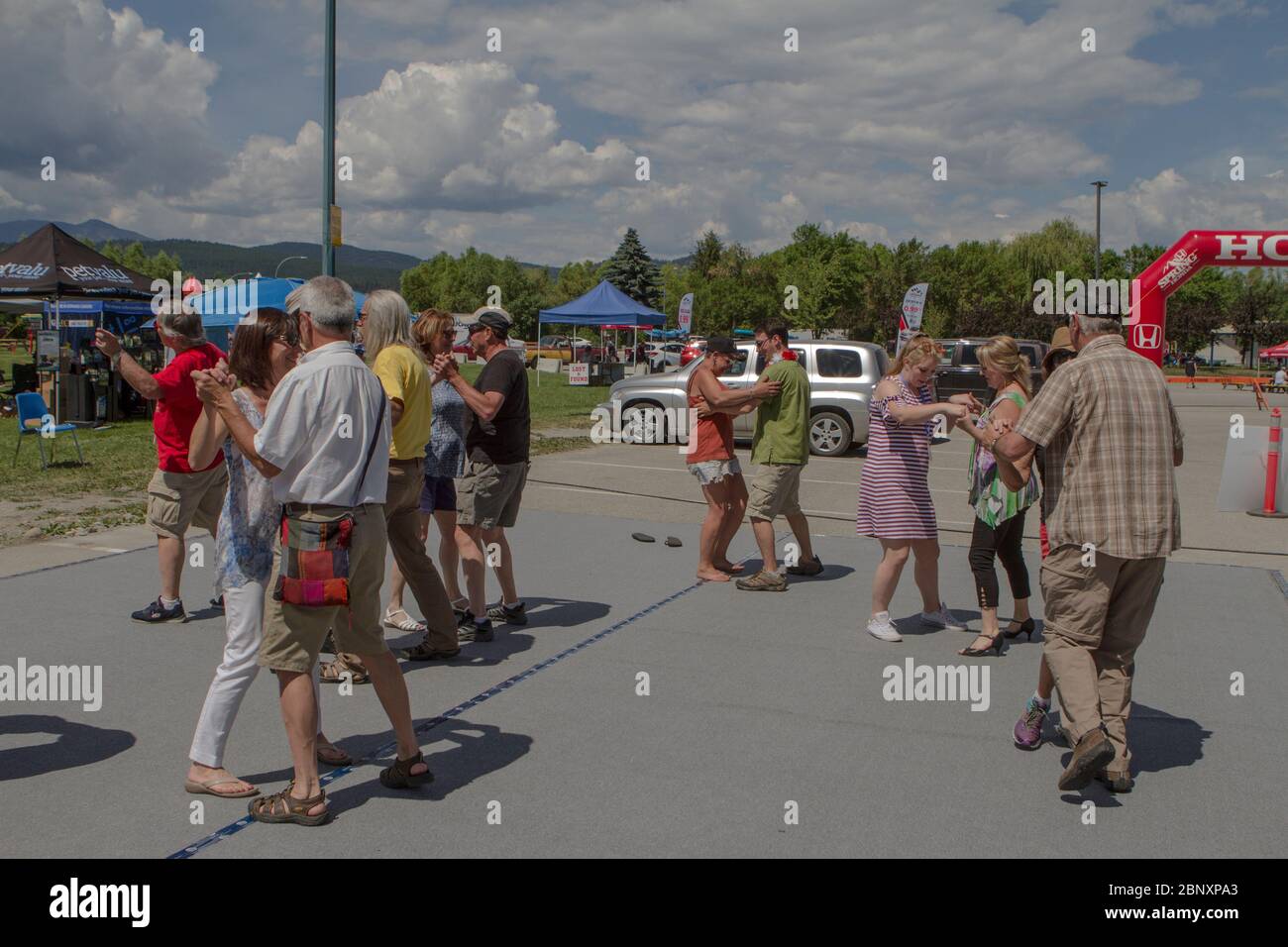 People dancing and having fun at outdoor concert Stock Photo - Alamy
