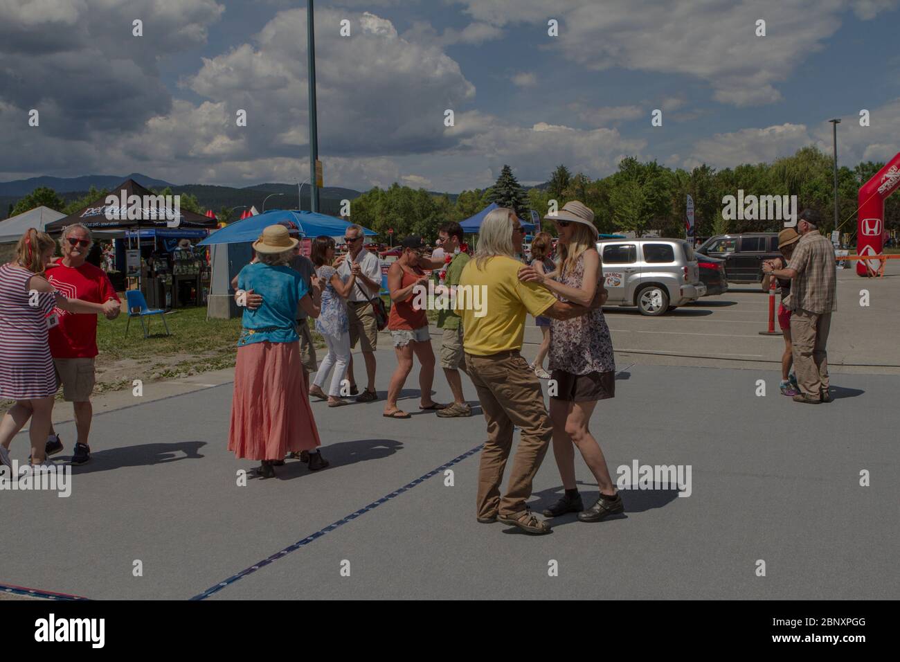 People dancing and having fun at outdoor concert Stock Photo - Alamy