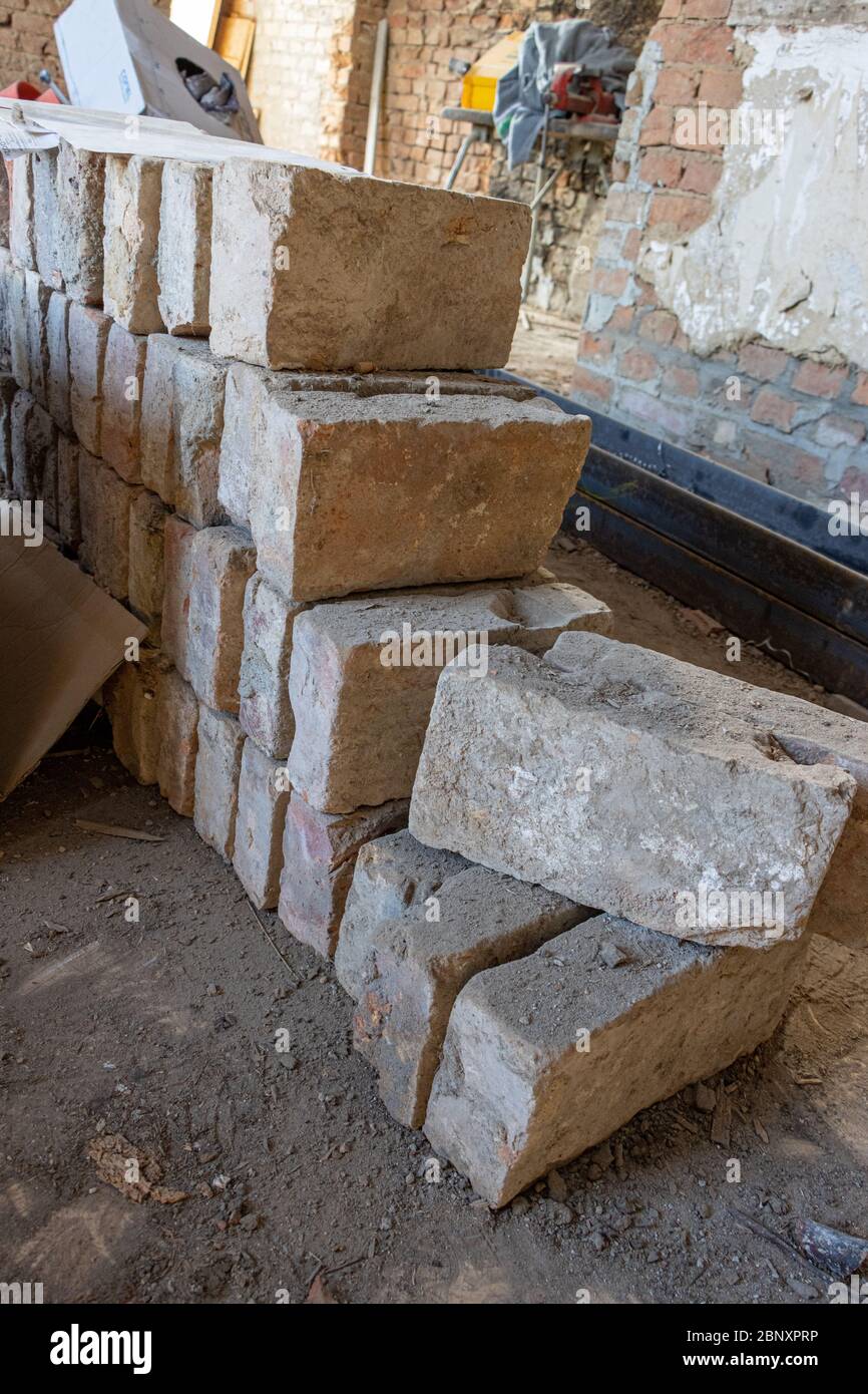 some Bricks lying stacked on a building site Stock Photo - Alamy