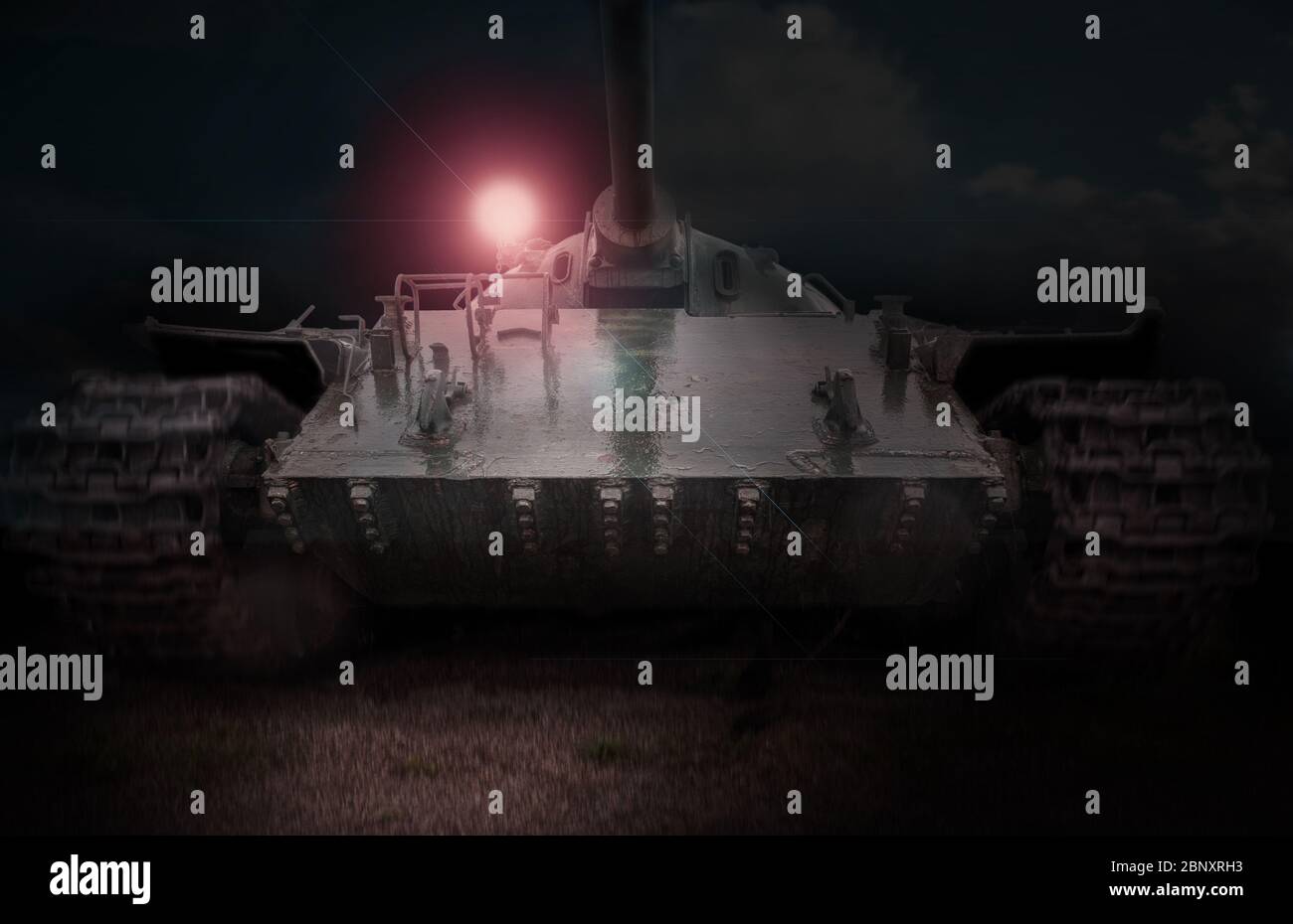 The vision of a threatening tank approaching in the dark with a ...