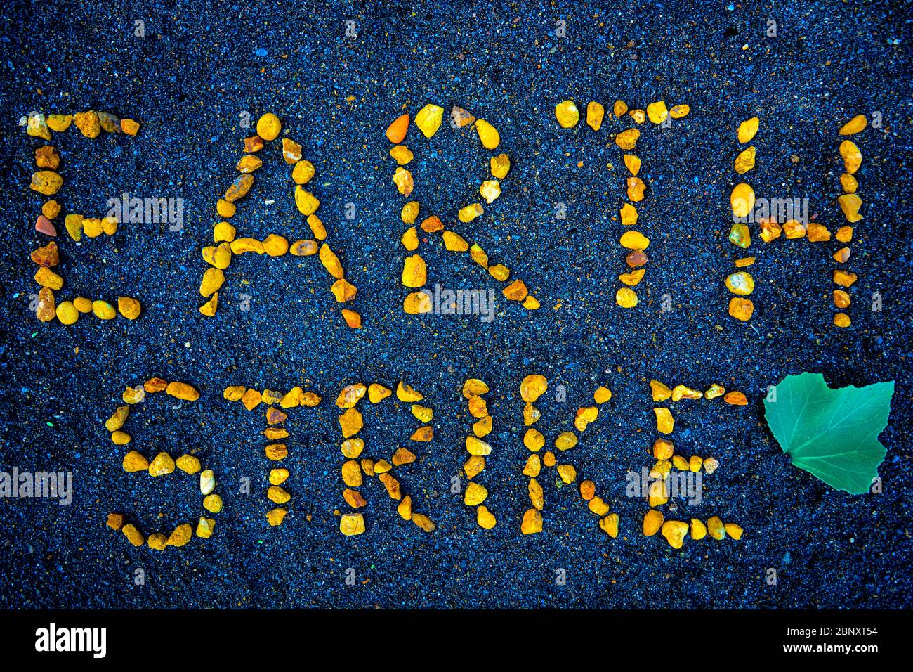 Earth Strike, strong concept written in words made on yellow and orange ...