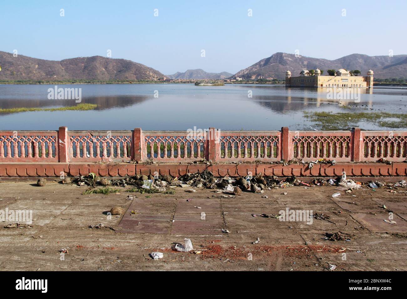 Trash around famous Jal Mahal water palace in Rajasthan Stock Photo - Alamy