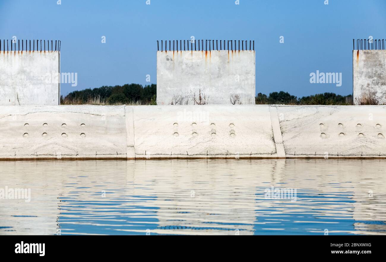 White coastal fortifications made of concrete blocks, front view ...