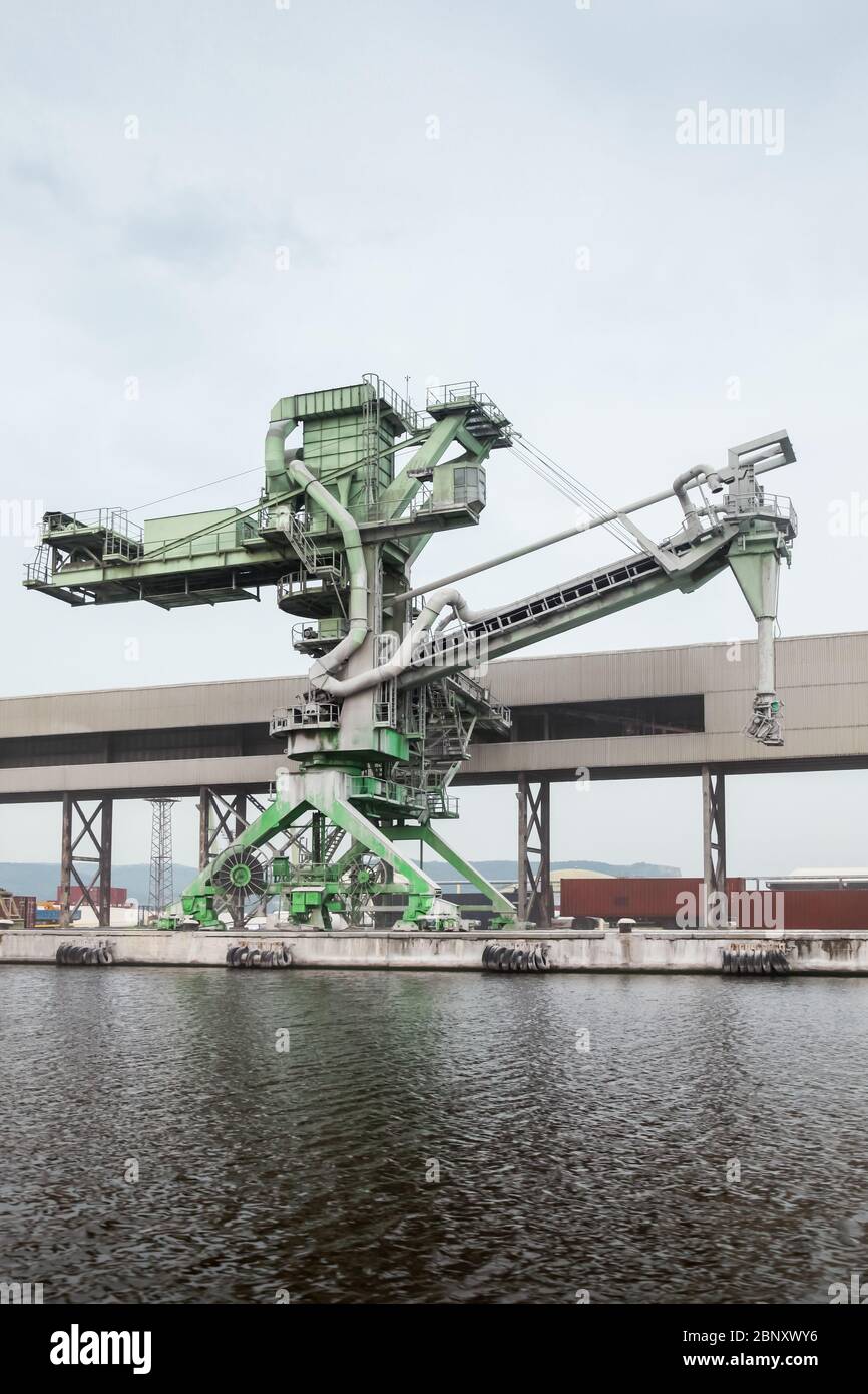 Green port crane for bulk products loading, close-up photo, Varna ...