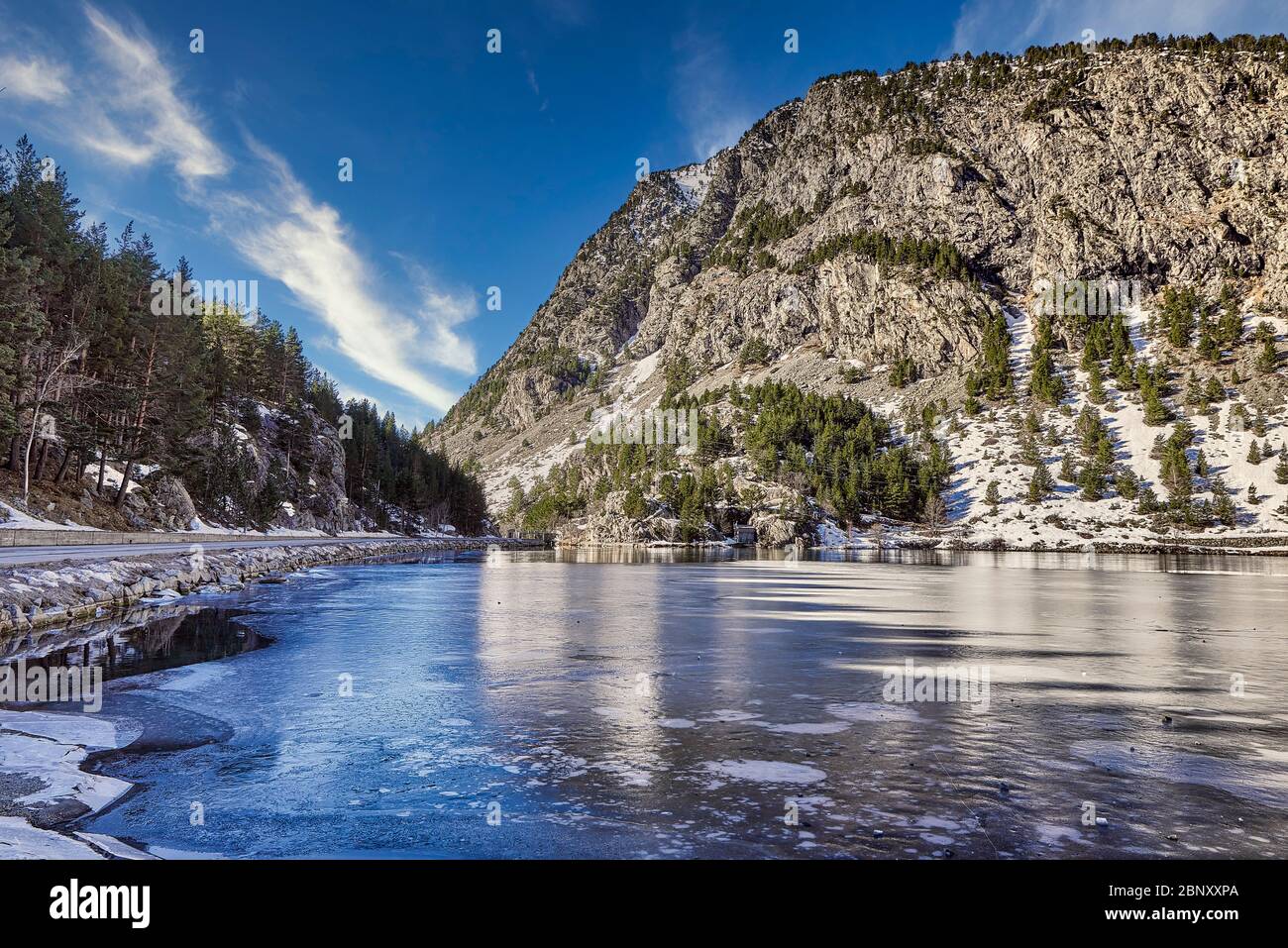 Winter landscape in the lagoon of the spa resort of Panticosa with the ...