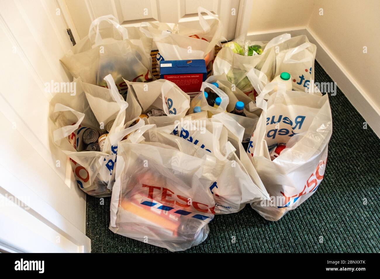 Shopping carrier bags front door hi-res stock photography and images ...