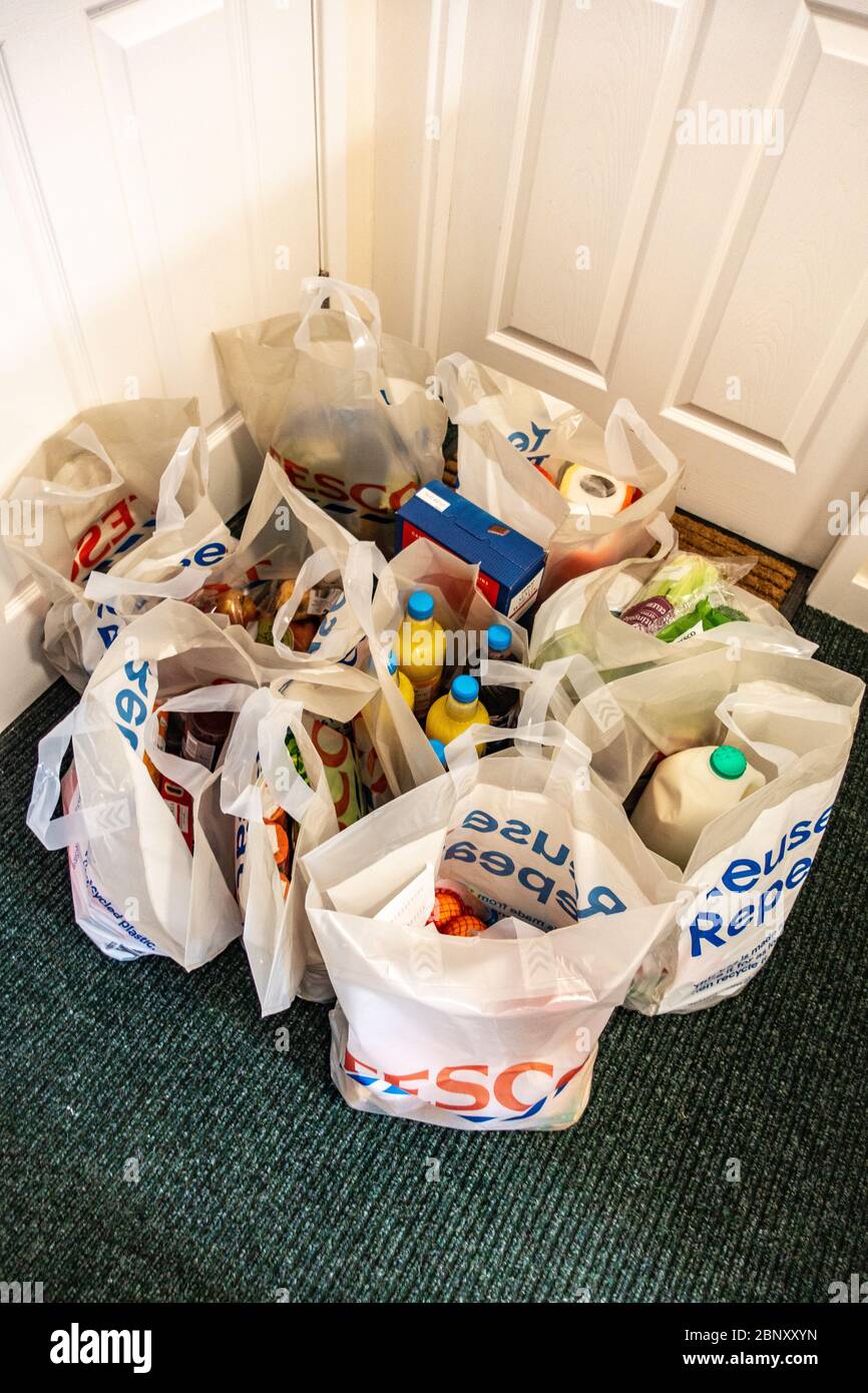 Shopping carrier bags front door hi-res stock photography and images ...