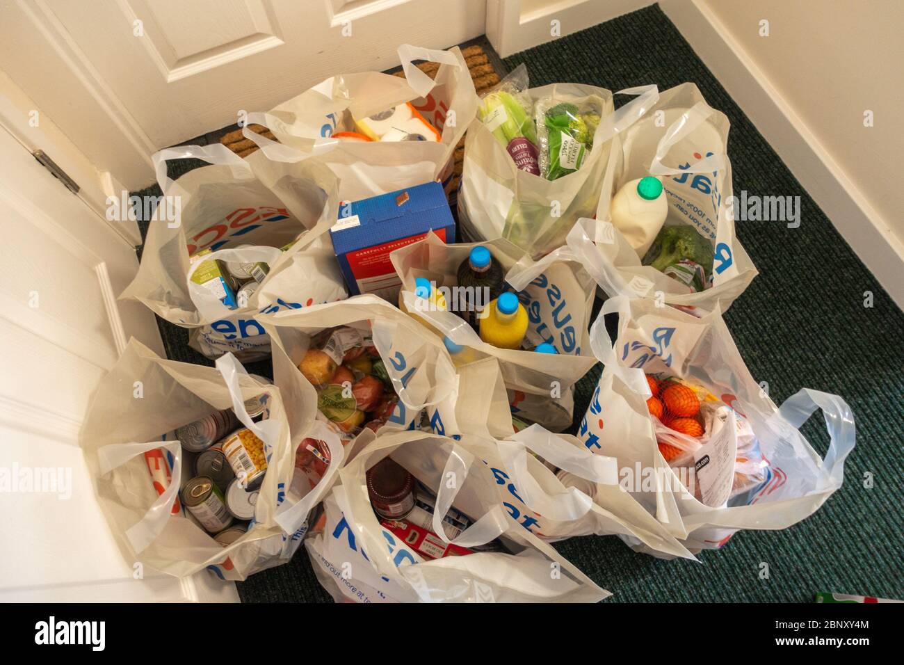 Shopping carrier bags front door hi-res stock photography and images ...