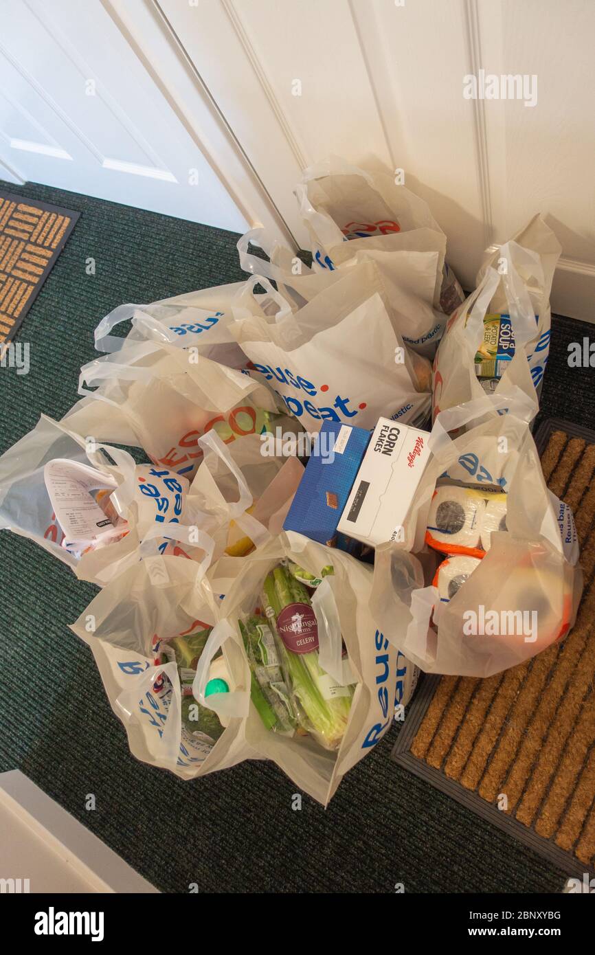 Shopping carrier bags front door hi-res stock photography and images ...