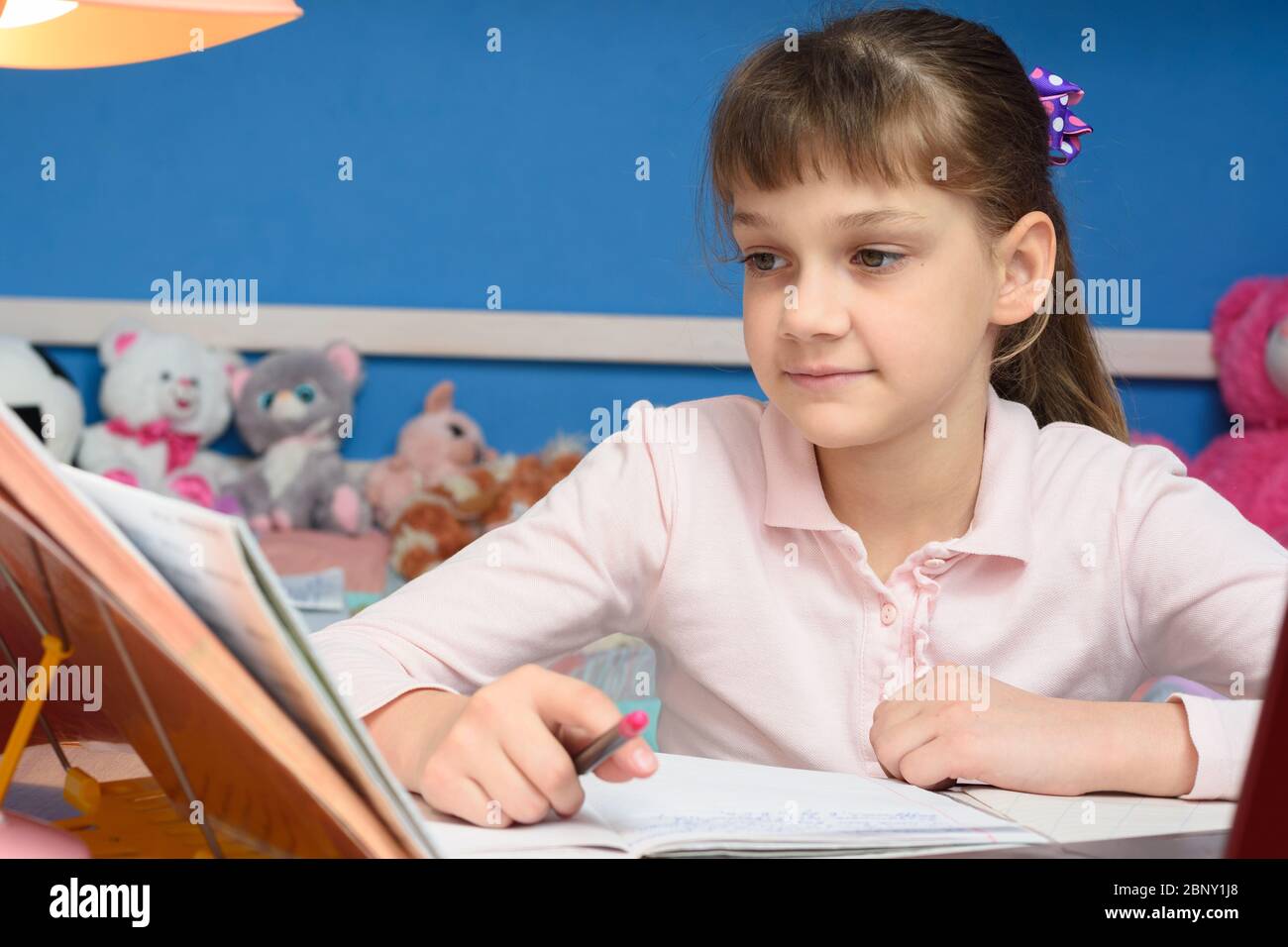 Student does homework at home in distance learning Stock Photo - Alamy