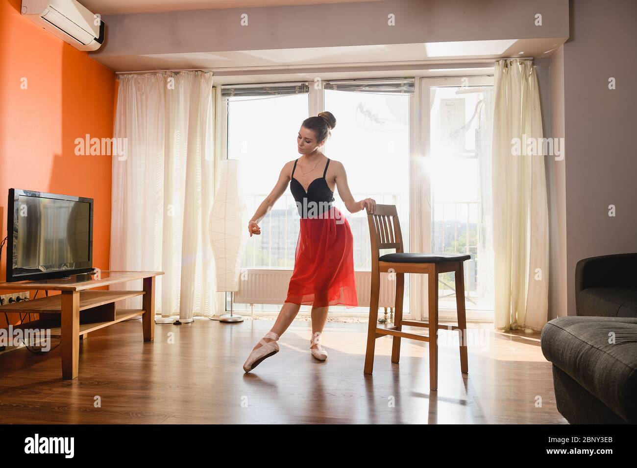 Beautiful ballerina girl dance at home isolation Stock Photo - Alamy