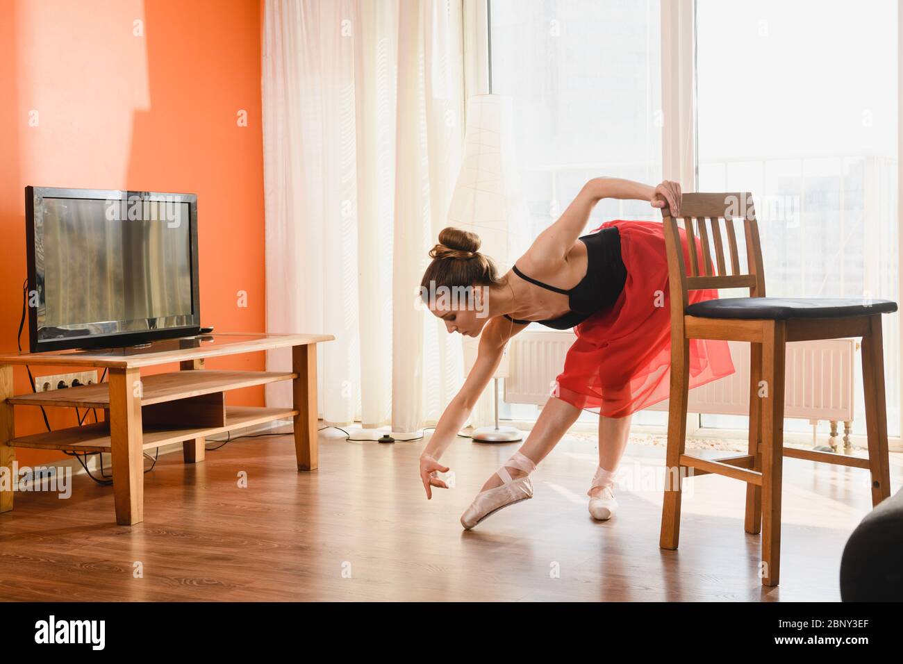 Graceful ballet dancer exercise at home isolation Stock Photo - Alamy