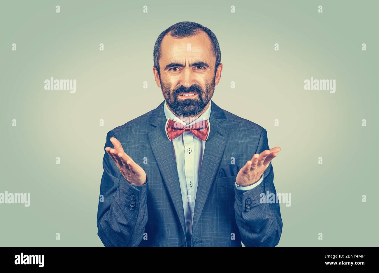 Angry young business man screaming hands in air in frustration looking ...