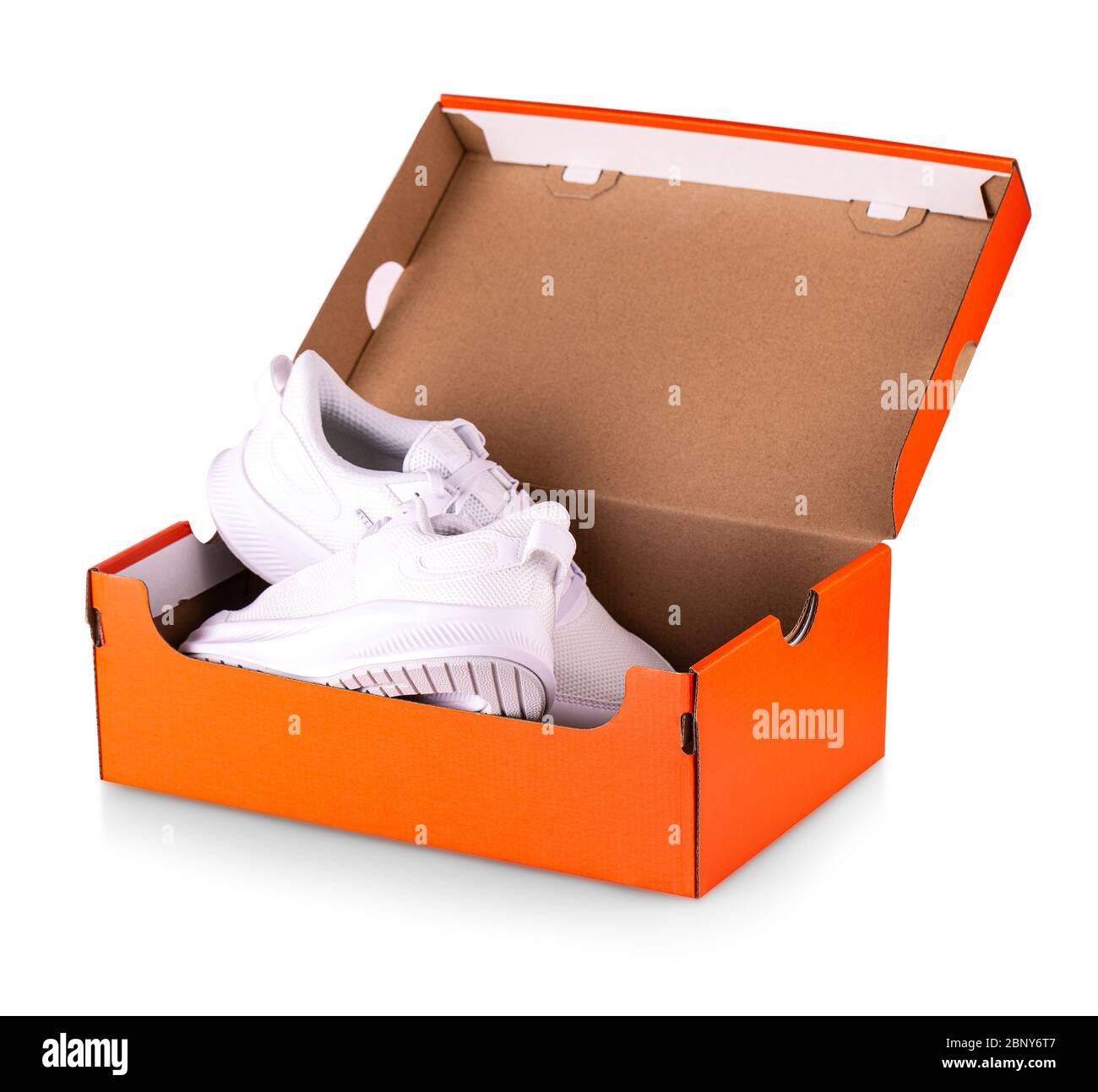 New white sneakers shoes in red box. Taken at studio and isolated over ...