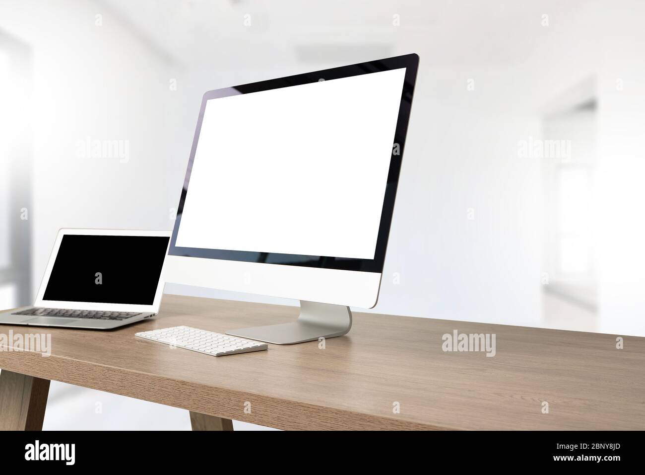 young man working Businessman using a desktop computer of the blank ...