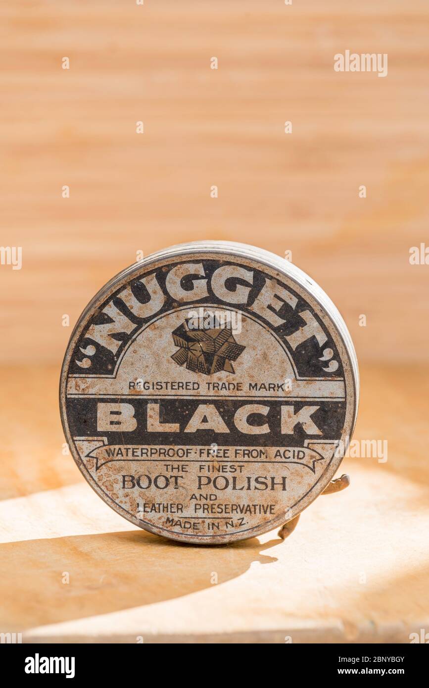 A still life studio image on a pale timber background of an antique ...