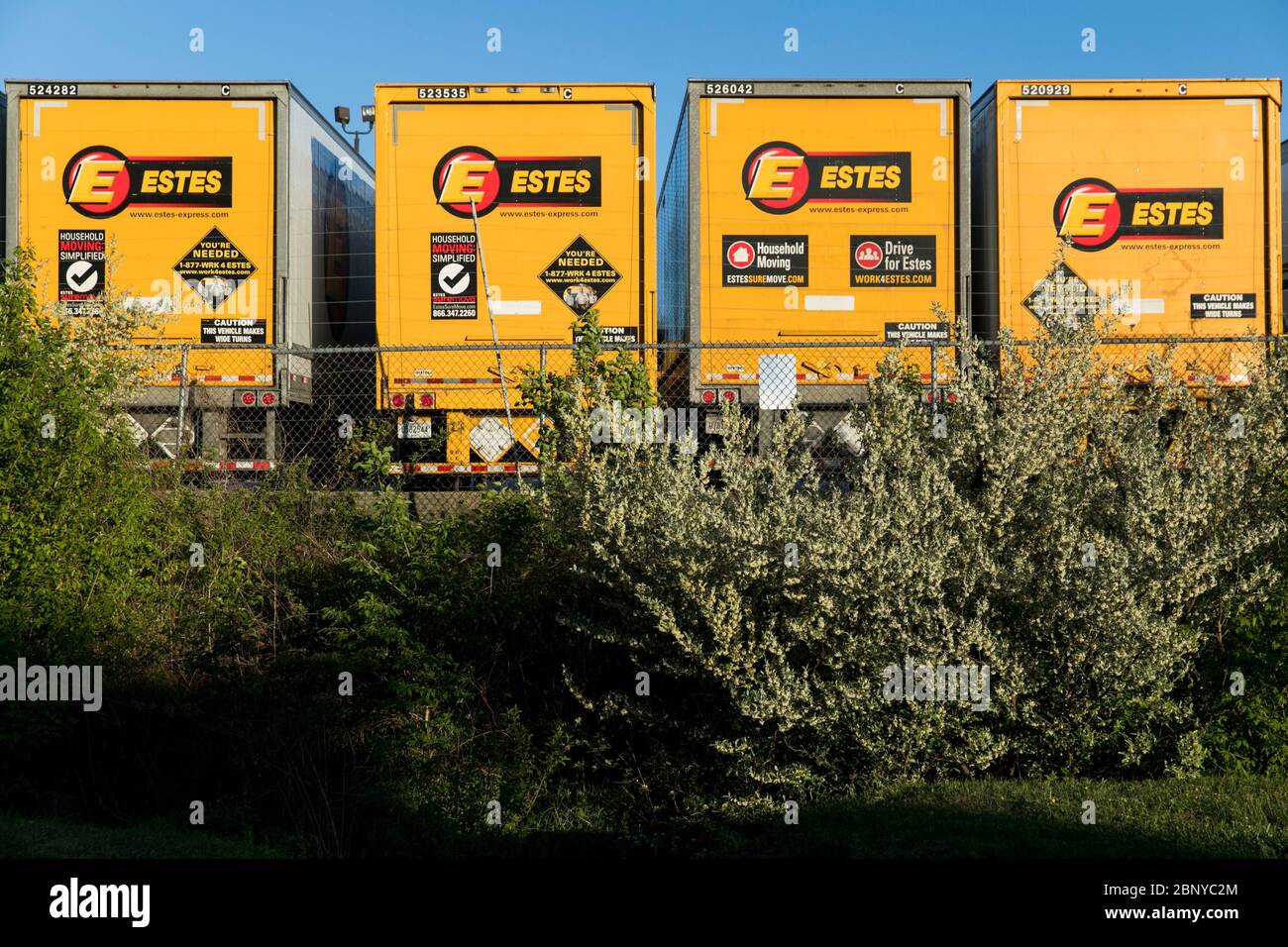 Truck trailers with logos outside of a facility occupied by Estes ...