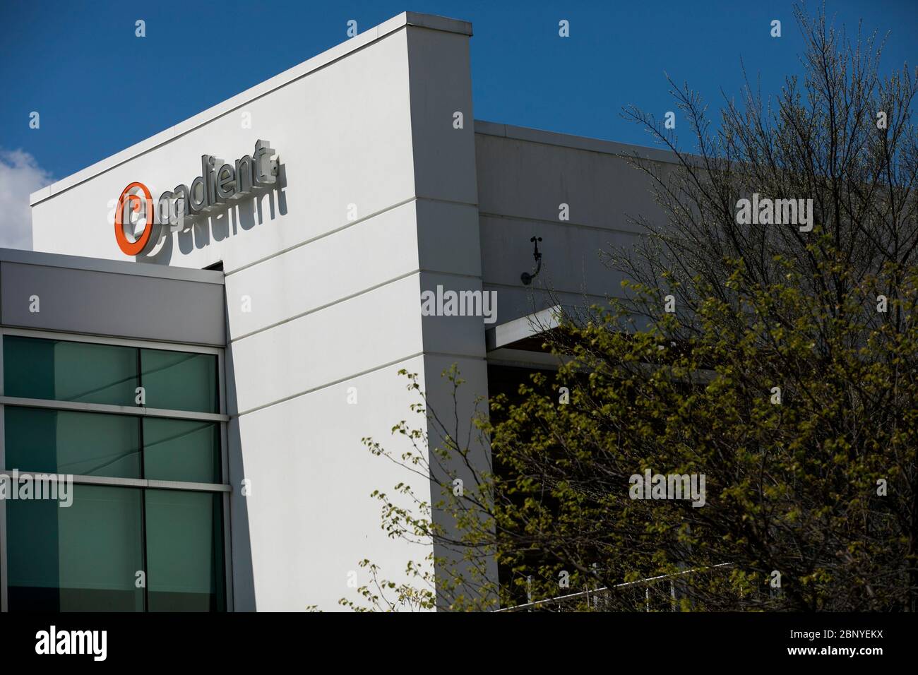 A logo sign outside of a facility occupied by Cadient Group in Malvern ...