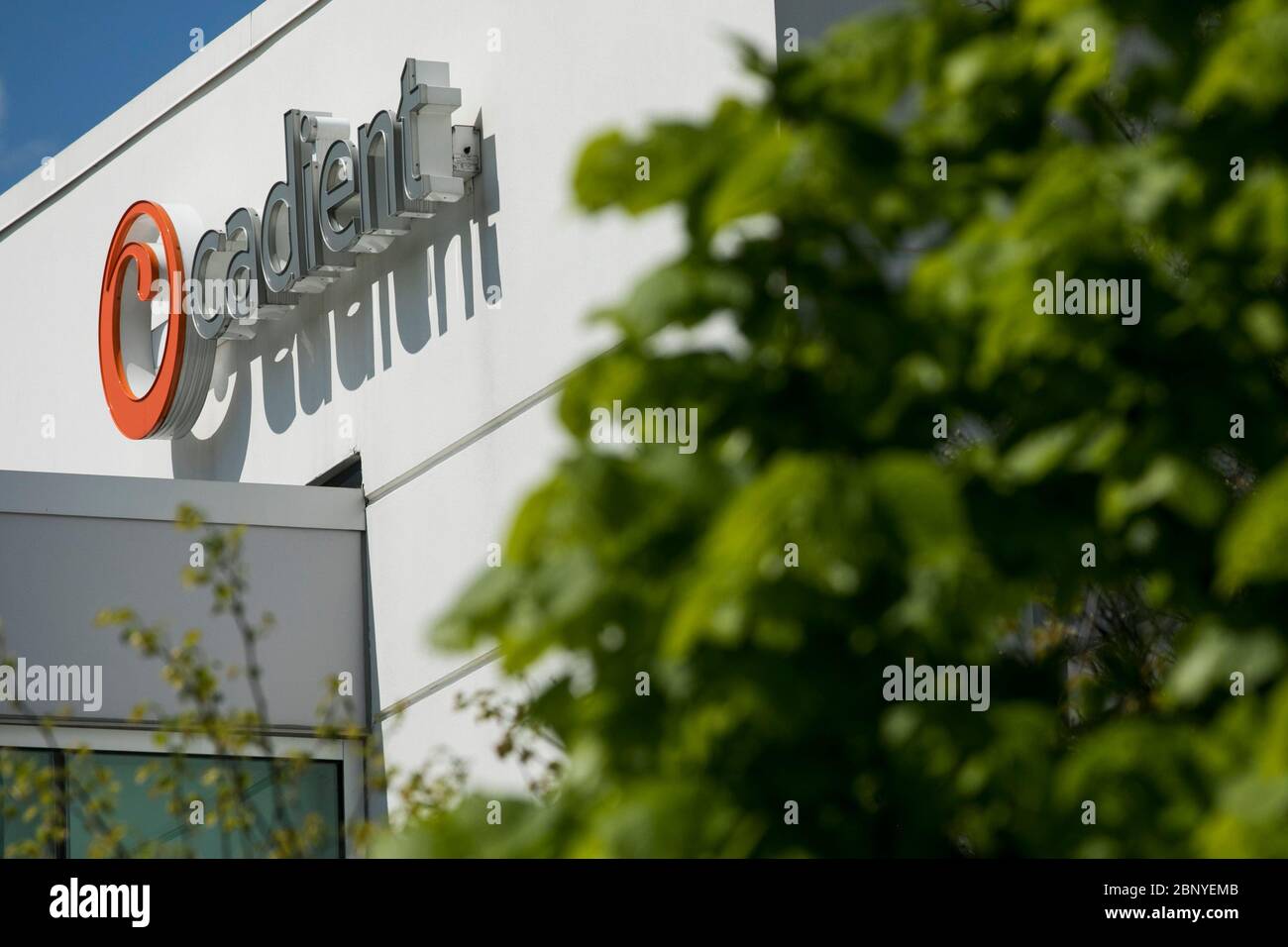 A logo sign outside of a facility occupied by Cadient Group in Malvern ...