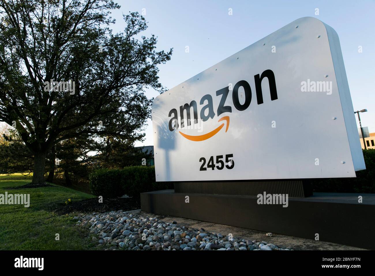 A logo sign outside of a facility occupied by Amazon in Norristown ...