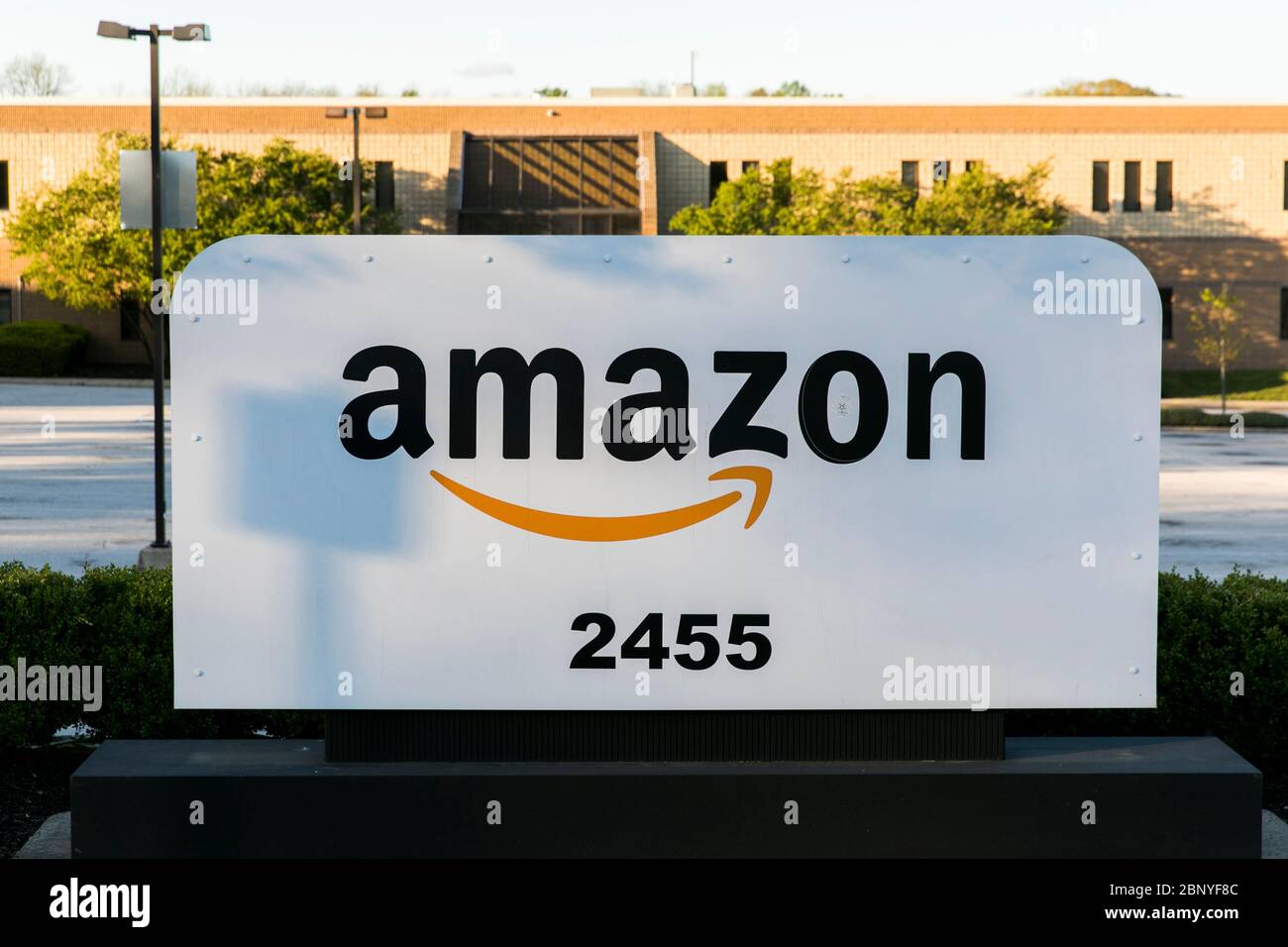 A logo sign outside of a facility occupied by Amazon in Norristown ...