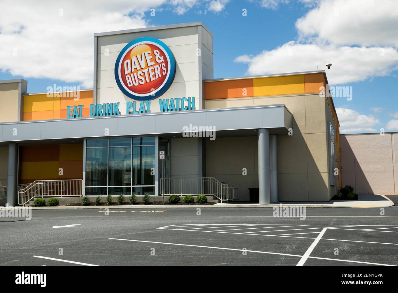 A logo sign outside of a Dave & Buster's location in Camp Hill ...