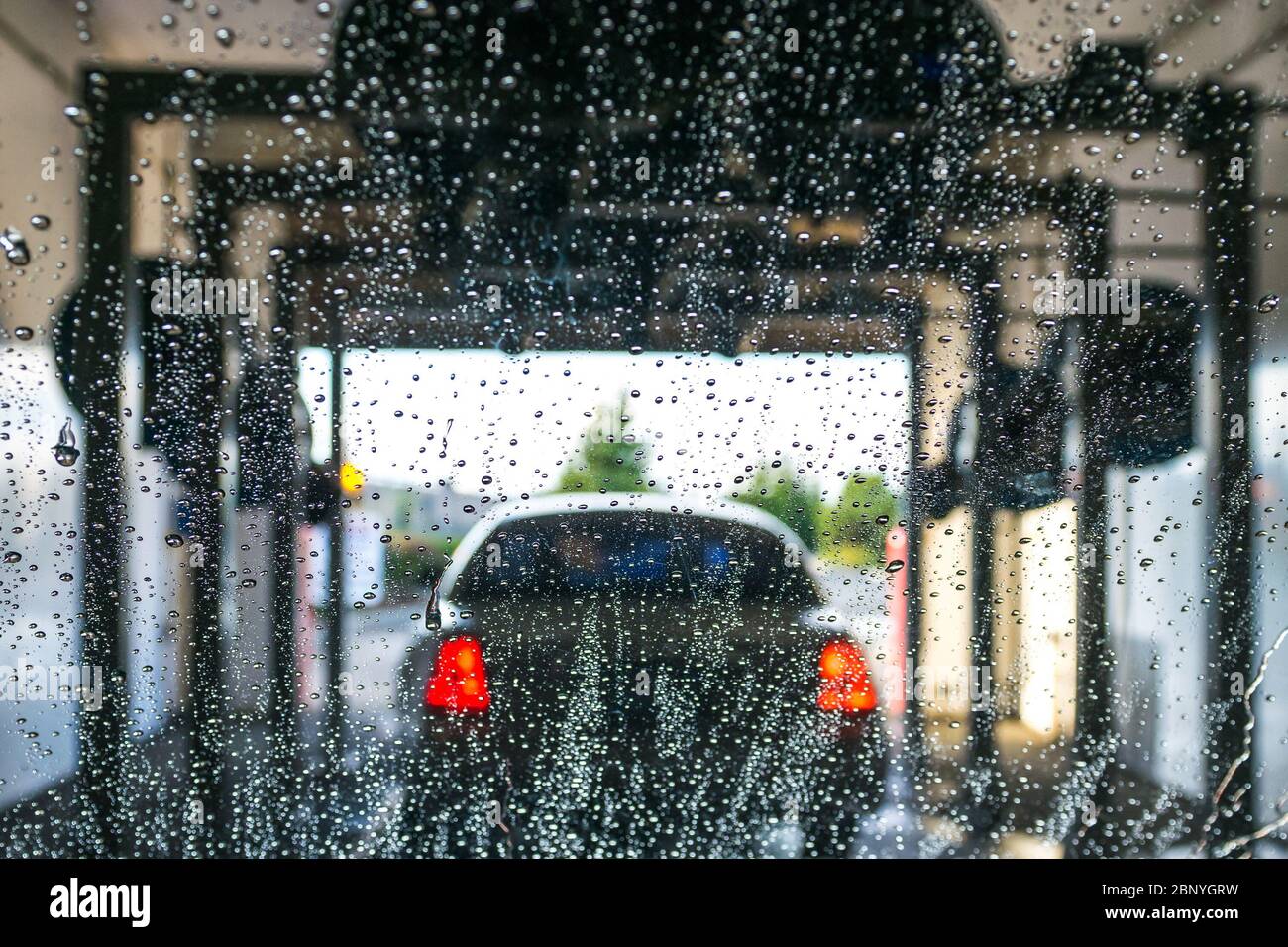 a car Running through automatic car wash Stock Photo - Alamy