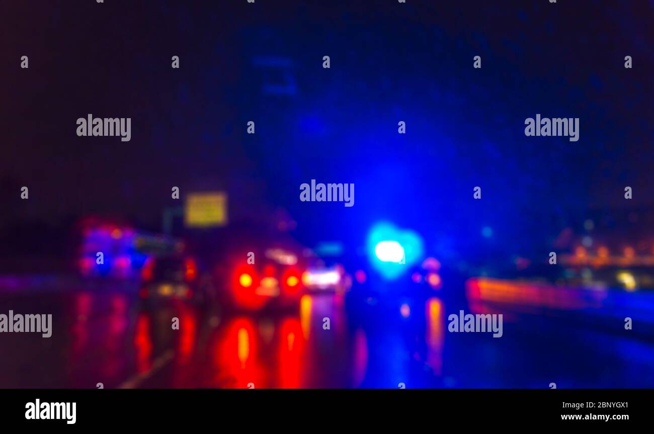 lighting of police car in the night during accident on the road when ...