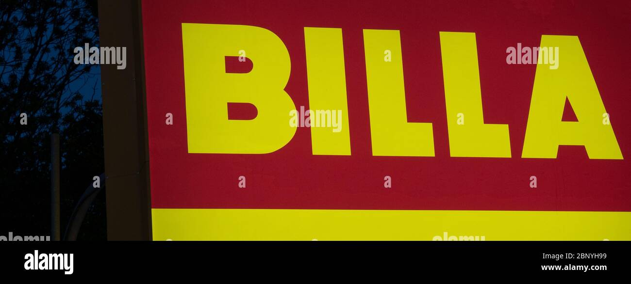 Glowing Billa Supermarket Sign on Night Sky Background Stock Photo - Alamy