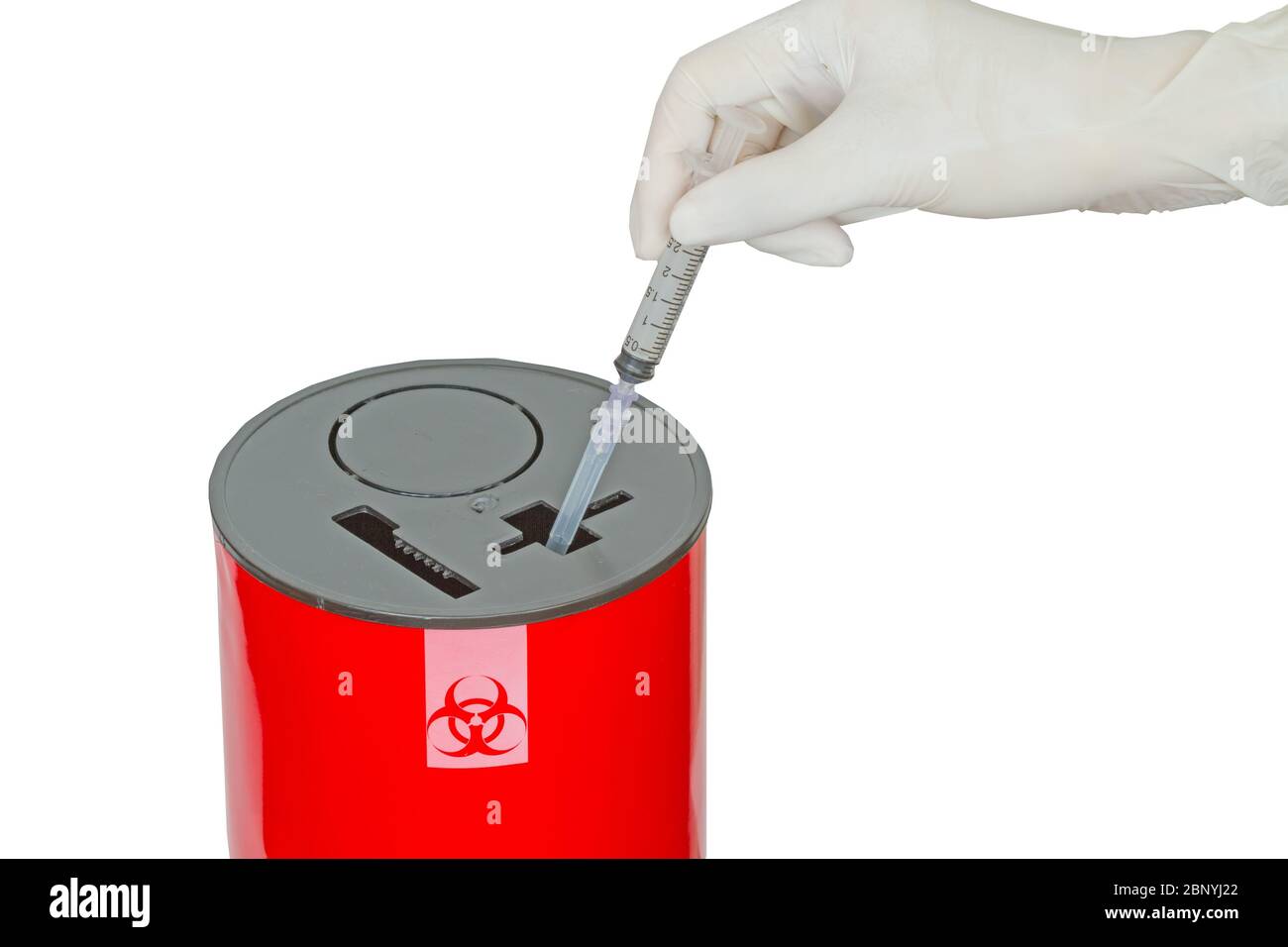 Doctor put syringe in red disposal boxes on white background Stock ...