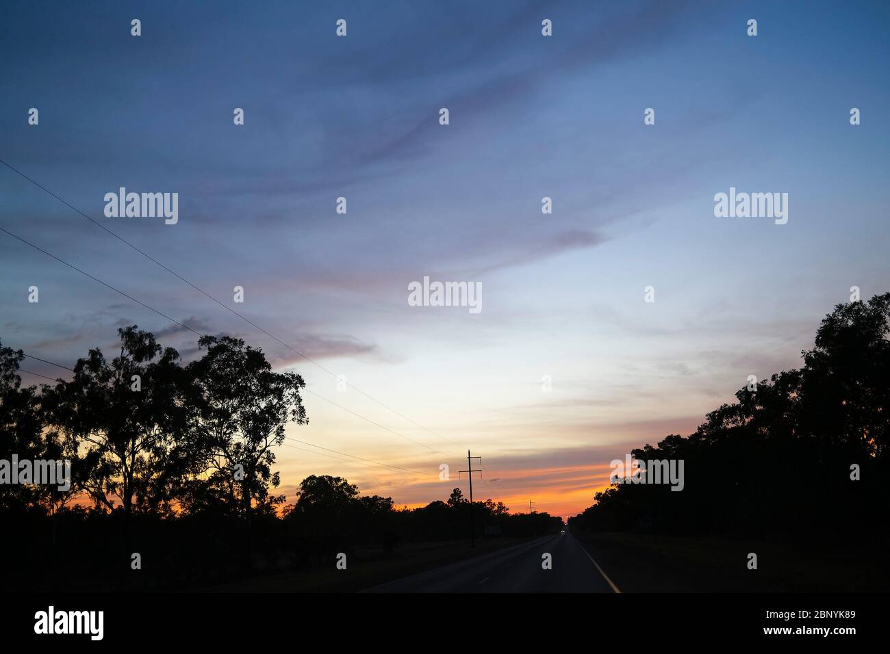 Driving at Sunset Stock Photo - Alamy
