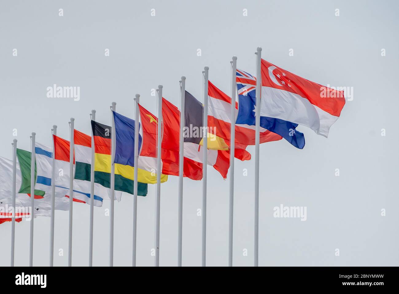 Many Nations Flag with a nice sky Stock Photo - Alamy