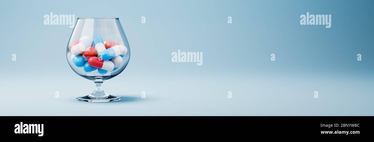Pills in a Drinking Glass Stock Photo - Alamy