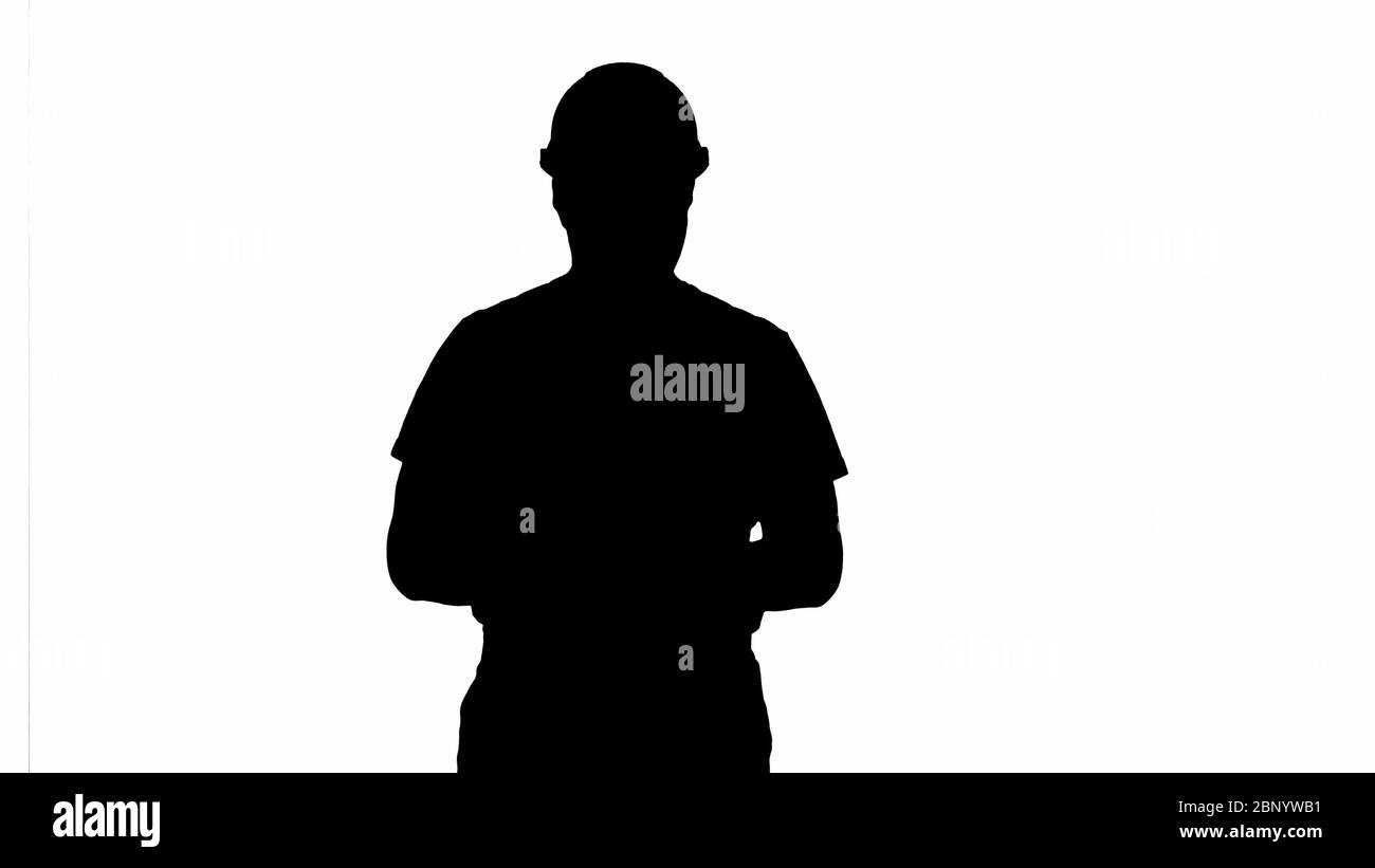 Silhouette A workman excitedly counting his salary Stock Photo - Alamy