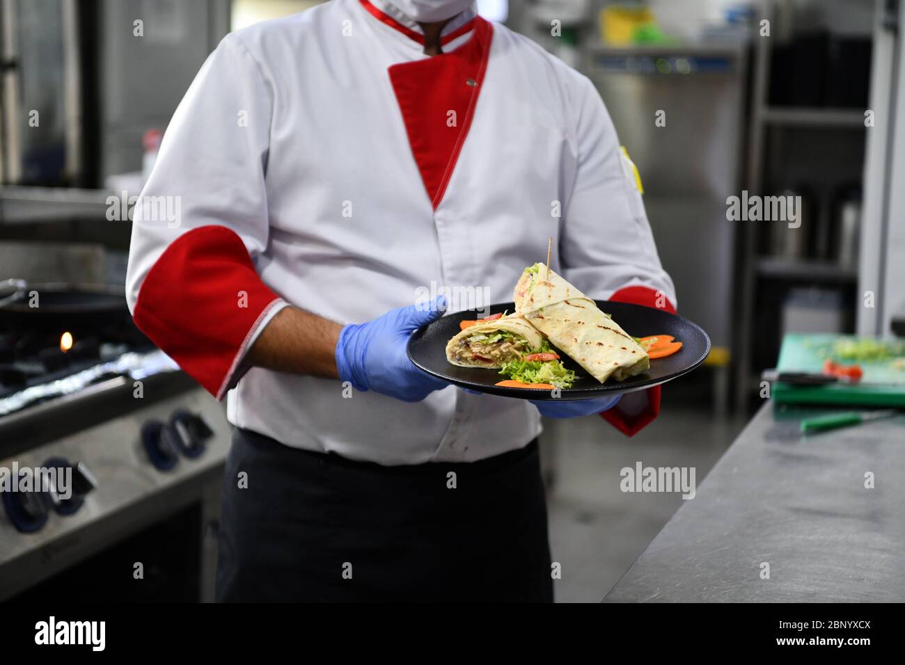 chef cook wearing face protective medical mask for protection from ...