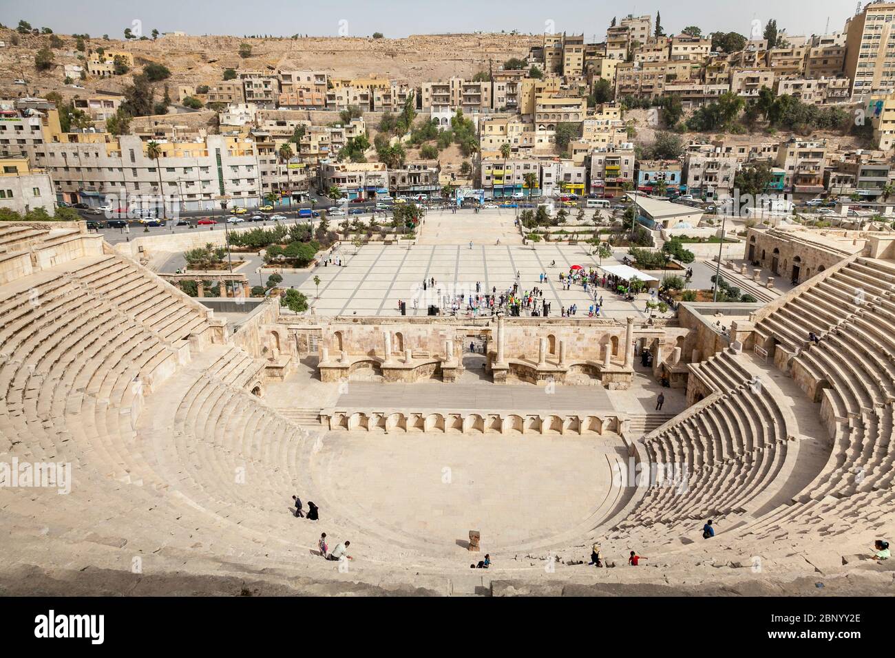 View of the ruins of an ancient Roman amphitheatre in the city of Amman ...