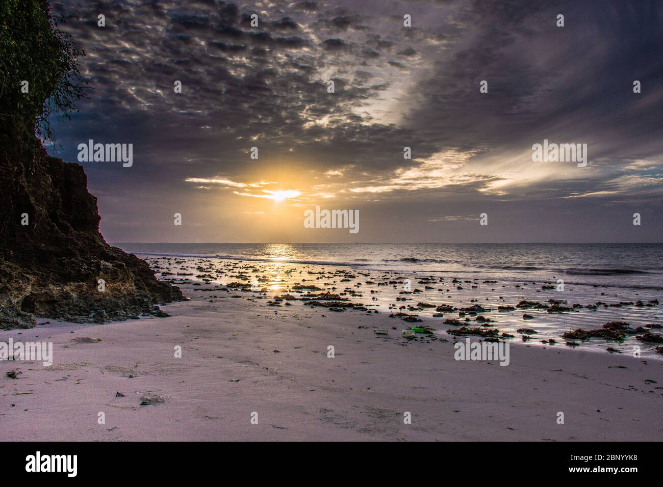 The Sun Rises at the Beach Stock Photo - Alamy