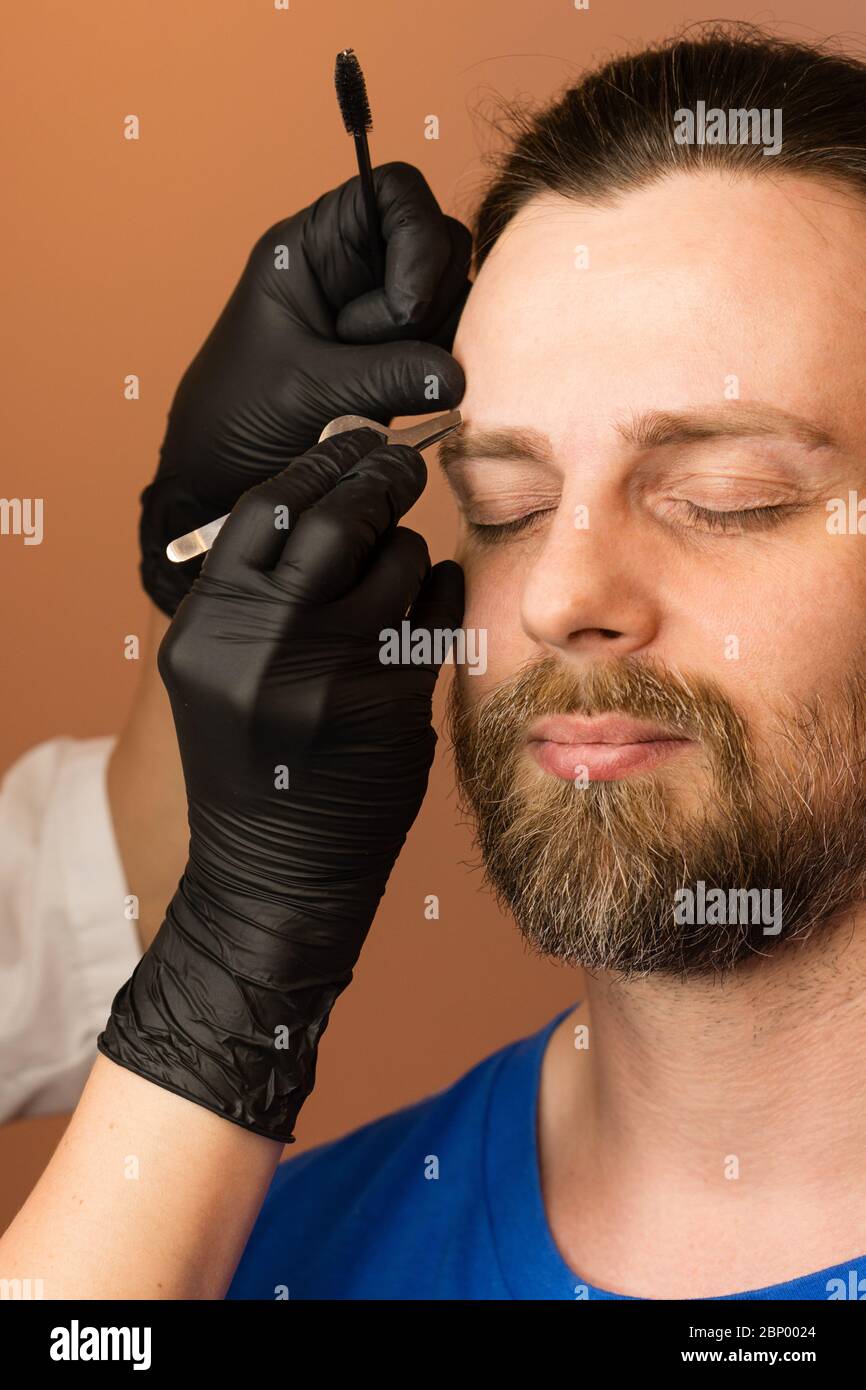 Threading eyebrows hi-res stock photography and images - Alamy